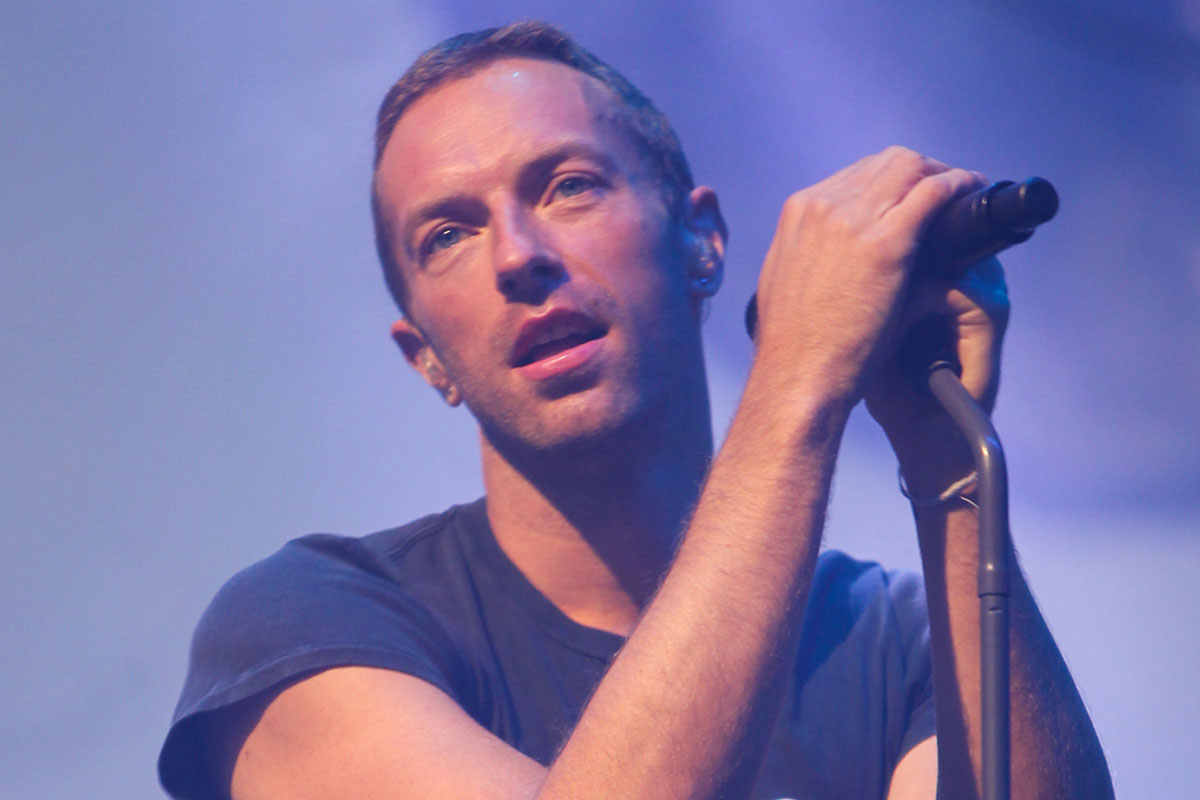 Chris Martin Playfully Warns Coldplay Fans About Cameras In First ...